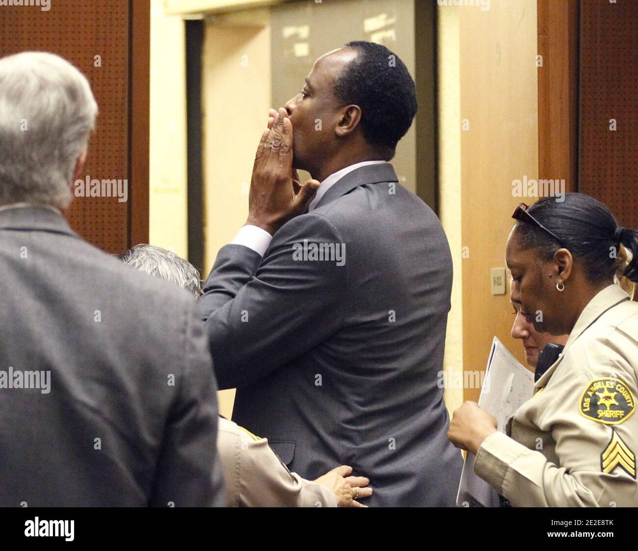 Dr. Conrad Murray blows a kiss to an unidentified member of the ...