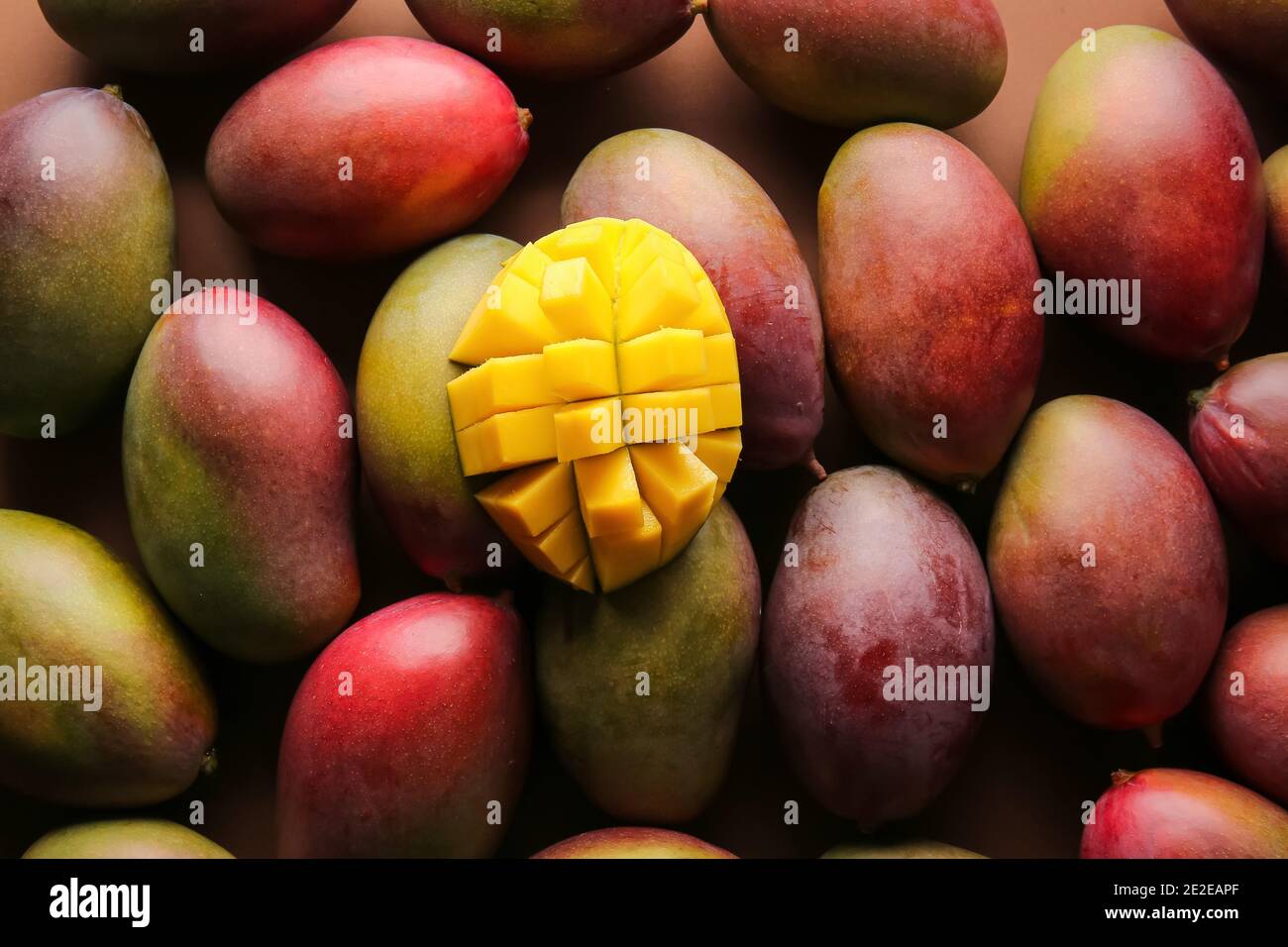 Many ripe mangoes as background Stock Photo - Alamy