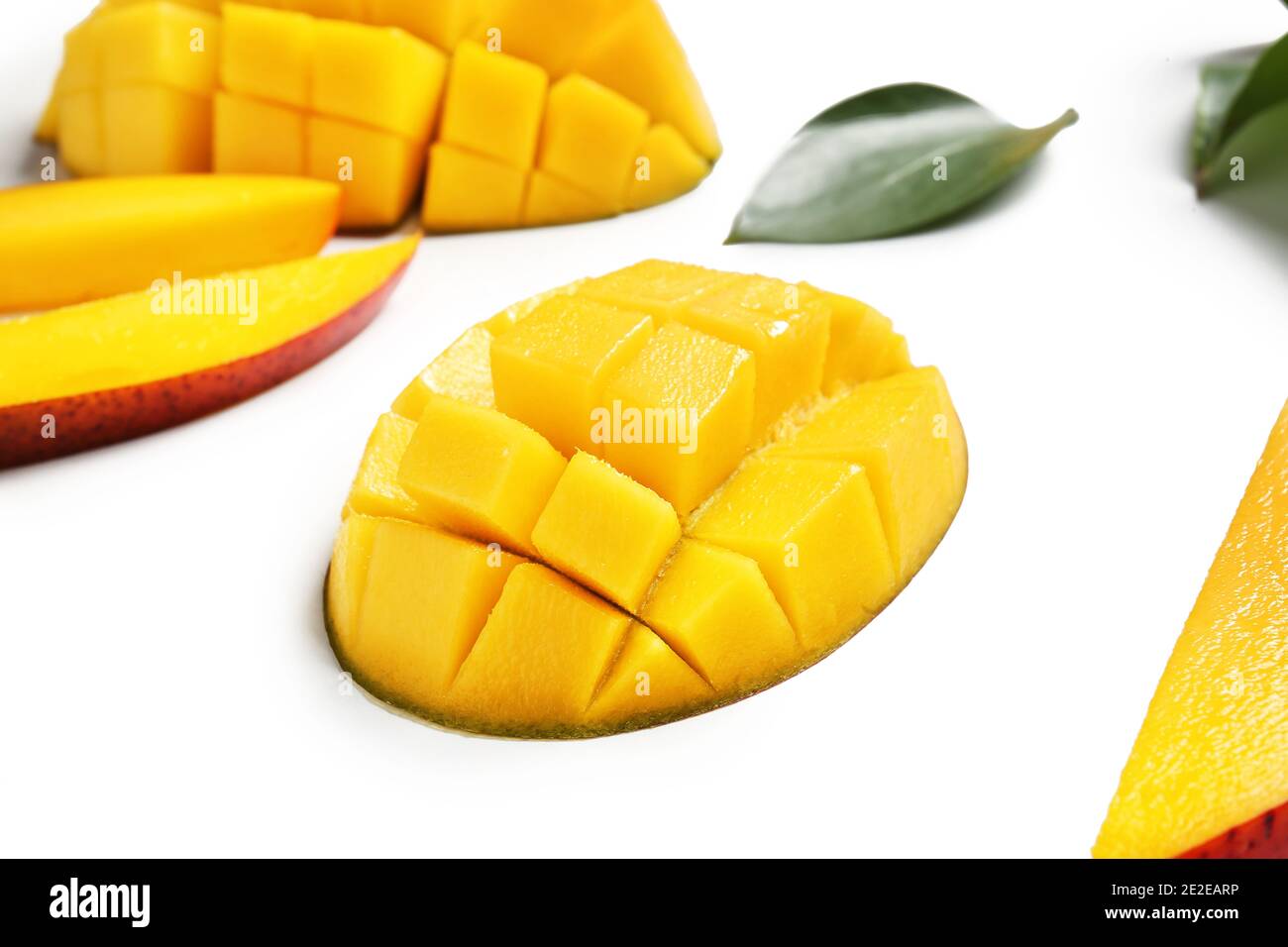 Sweet cut mango on white background Stock Photo - Alamy