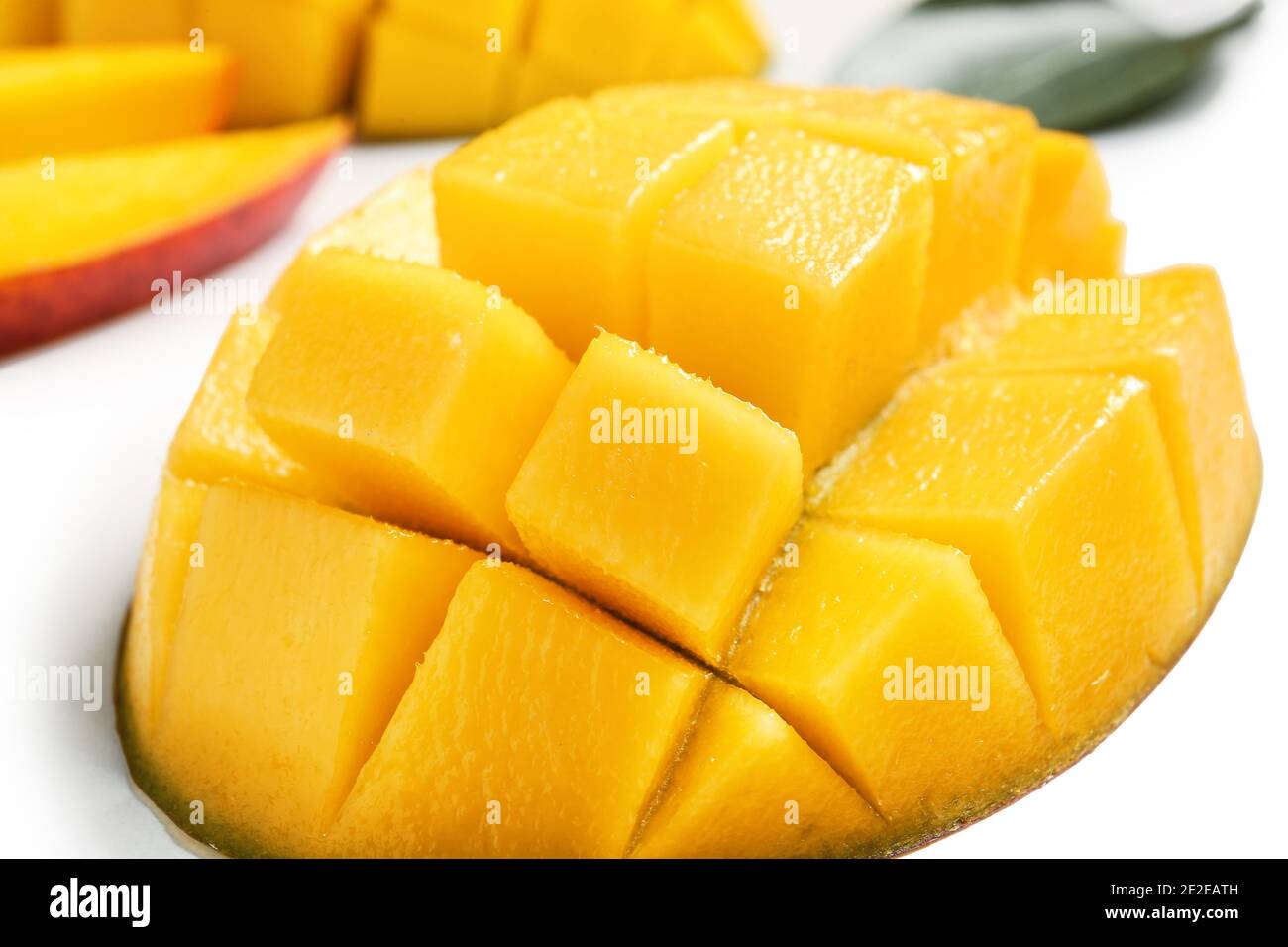Sweet cut mango on white background, closeup Stock Photo - Alamy