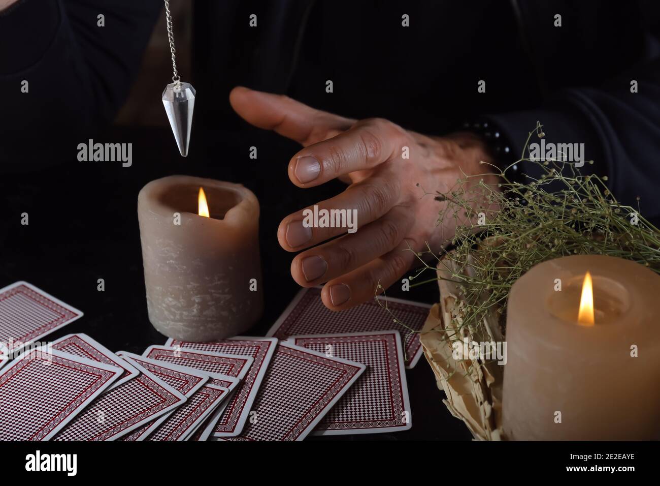 Fortune teller reading future at table Stock Photo - Alamy