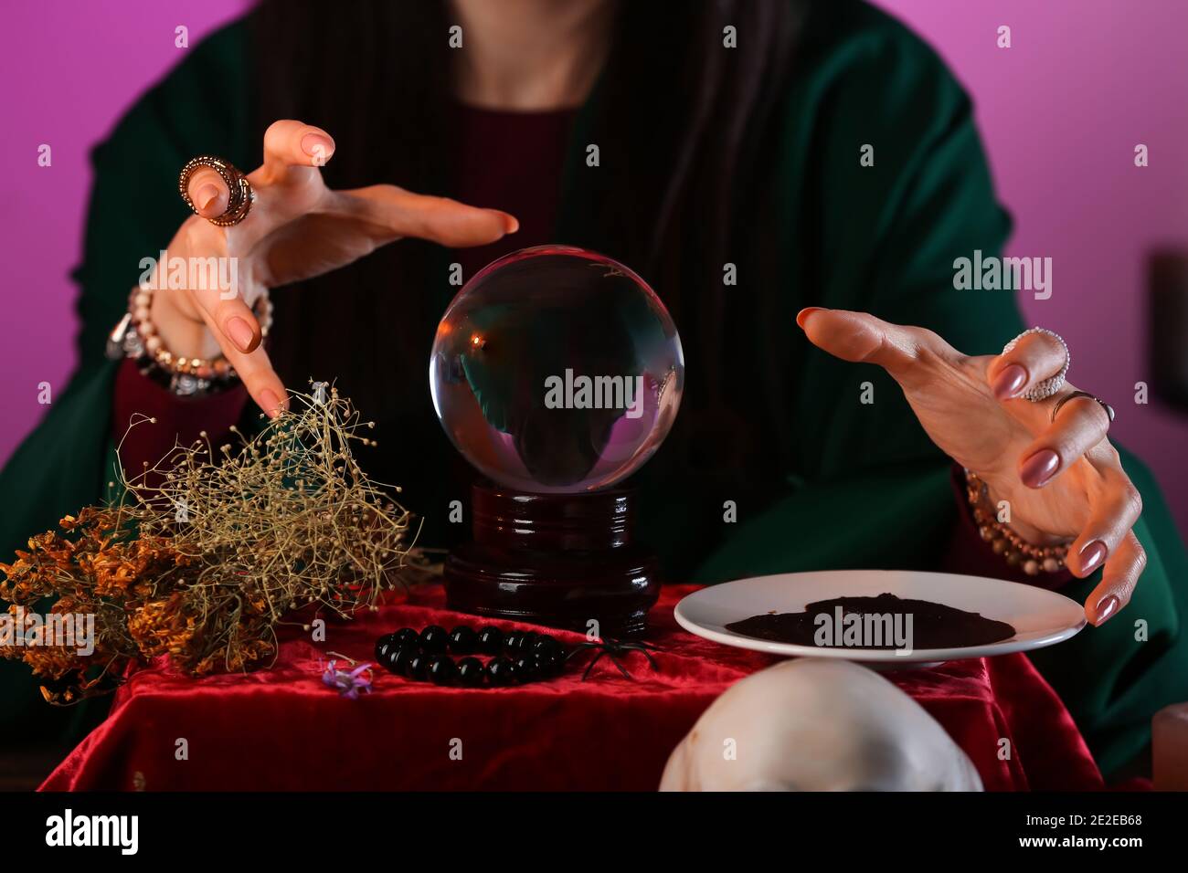 Fortune teller reading future at table Stock Photo - Alamy