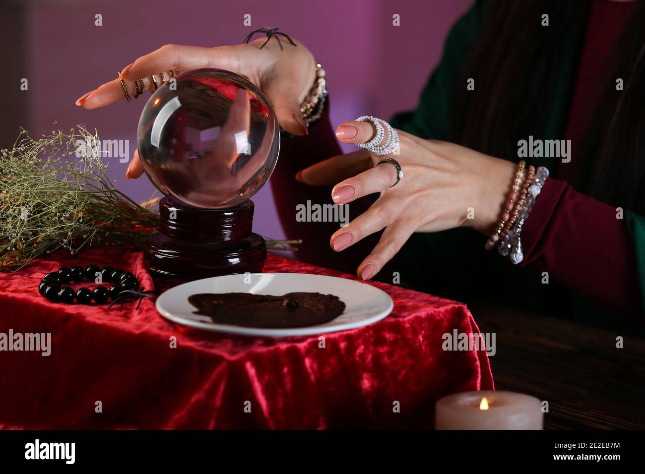 Fortune teller reading future at table Stock Photo - Alamy