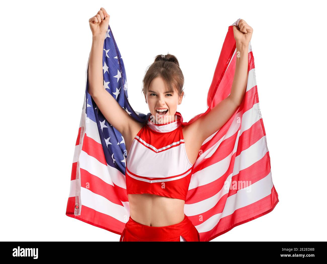 Beautiful young cheerleader with USA flag on white background Stock ...