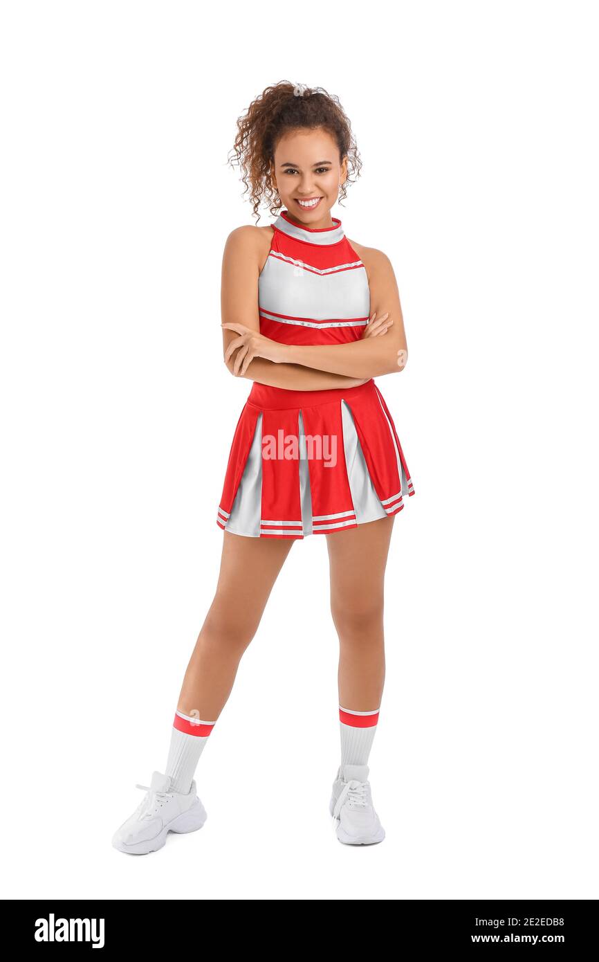 Beautiful young cheerleader on white background Stock Photo - Alamy