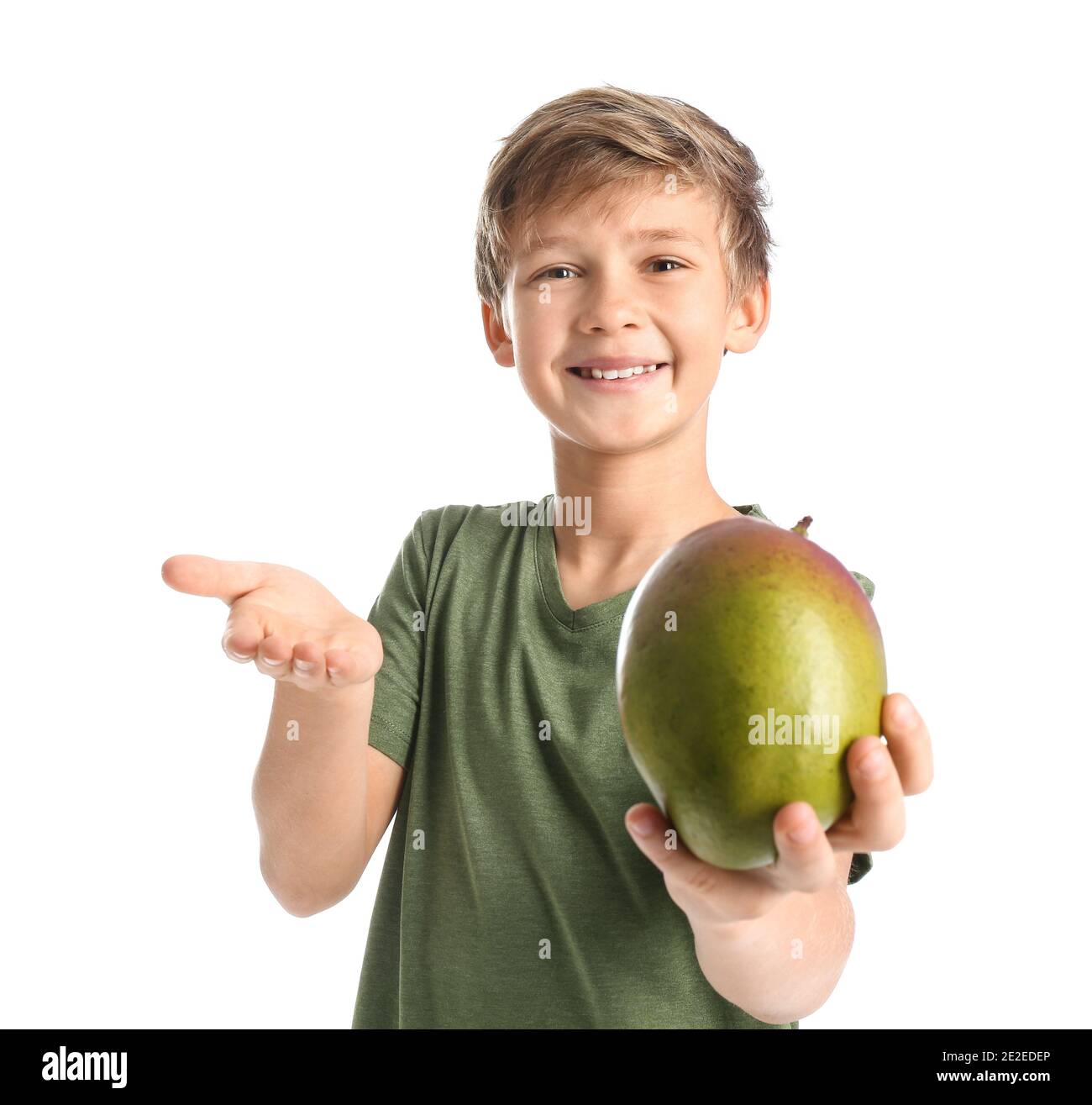 Cute little boy with fresh tasty mango on white background Stock Photo ...