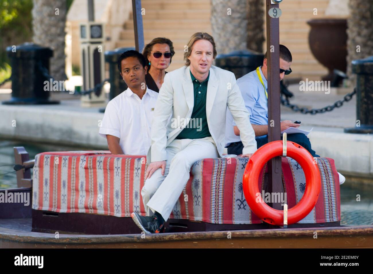 U.S. actor Owen Wilson (with his mother just behind him) arrives to ...