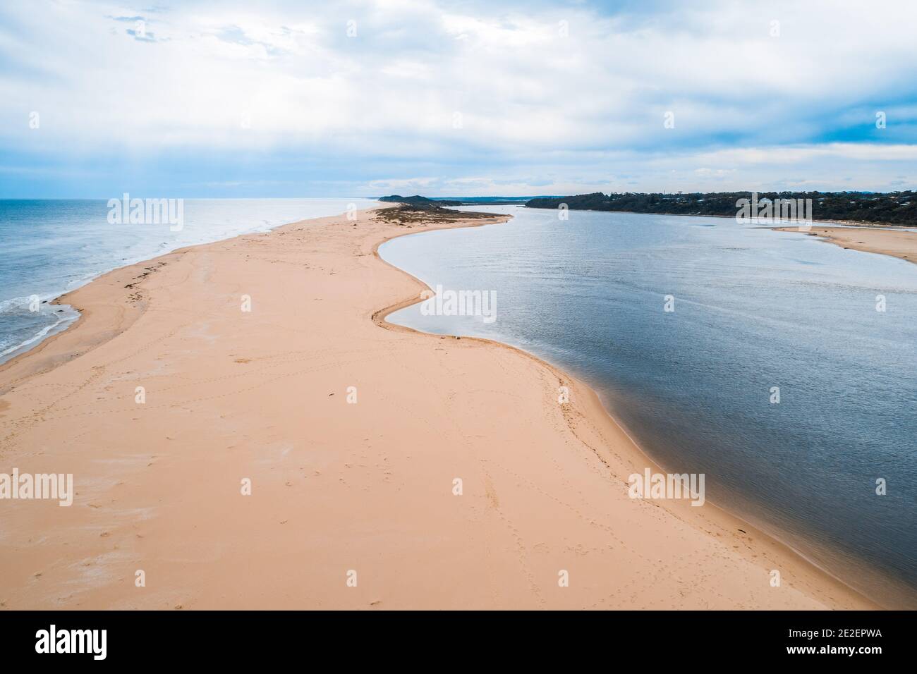 Patch of sand at ocean coastline in Australia Stock Photo - Alamy
