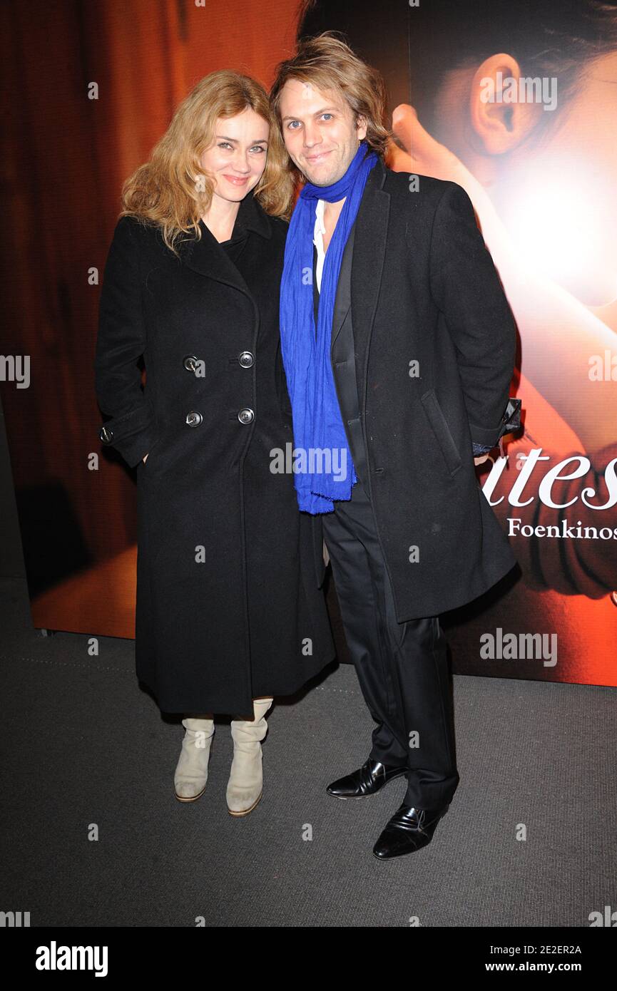 attending the premiere of 'La Delicatesse' at UGC Normandy in Paris ...