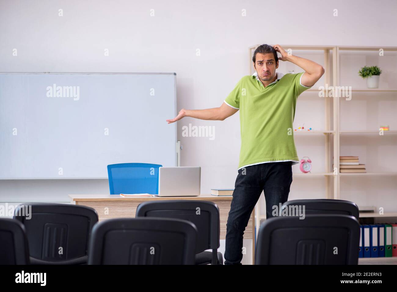 Young student in business presentation concept Stock Photo - Alamy