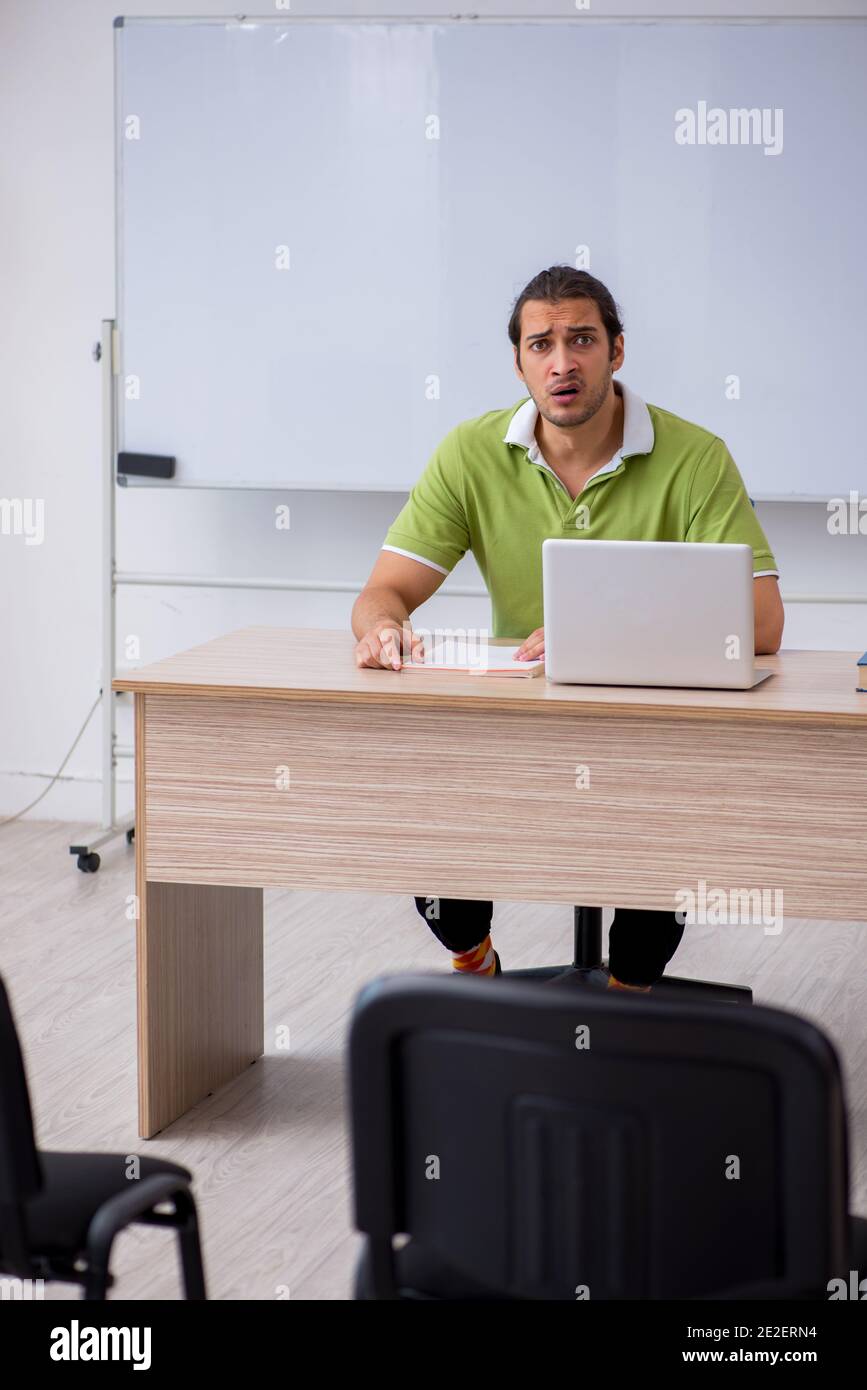 Young student in business presentation concept Stock Photo - Alamy