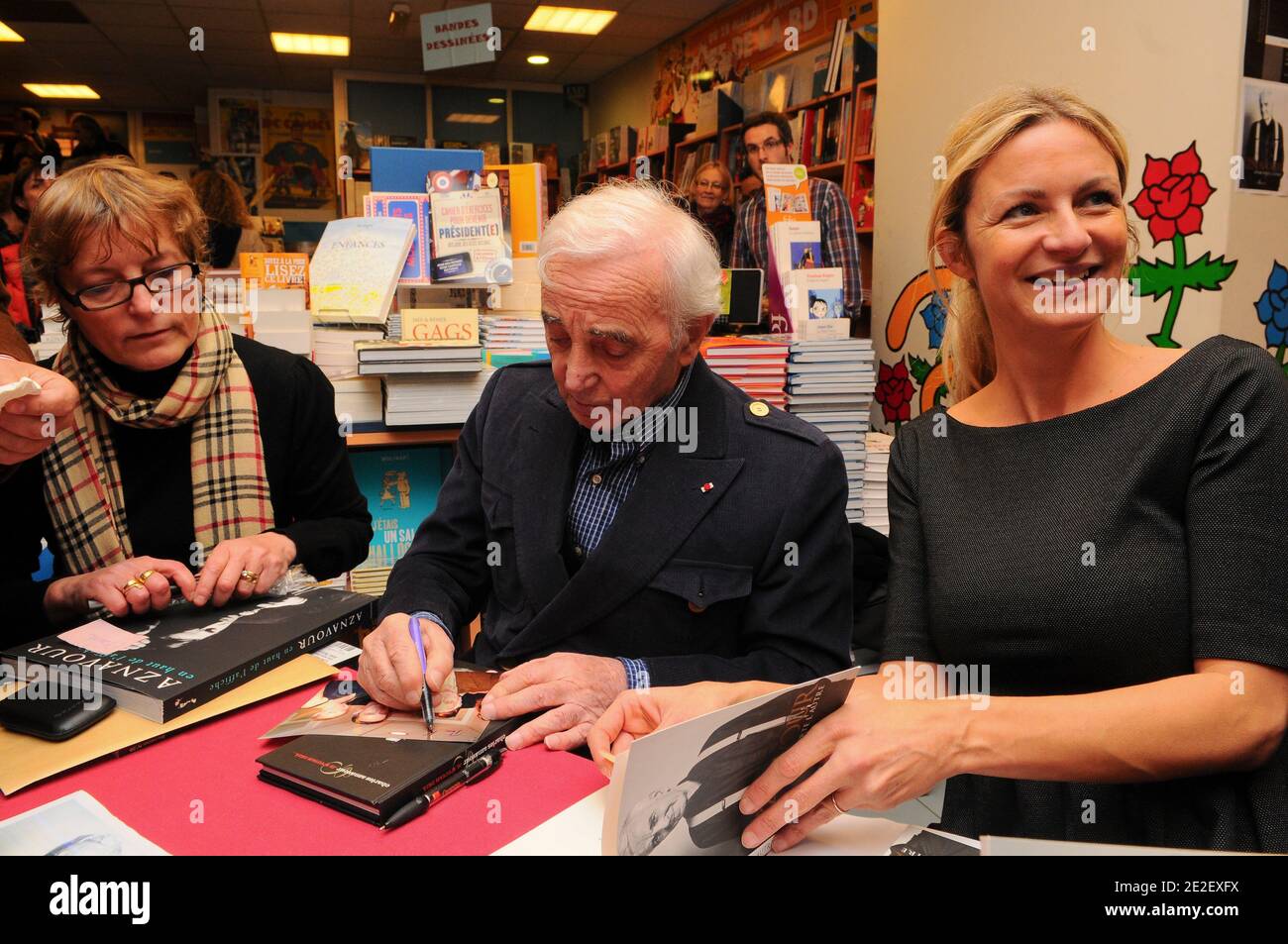 Singer Charles Aznavour signs copies of his new book 'D'Une Porte A L ...