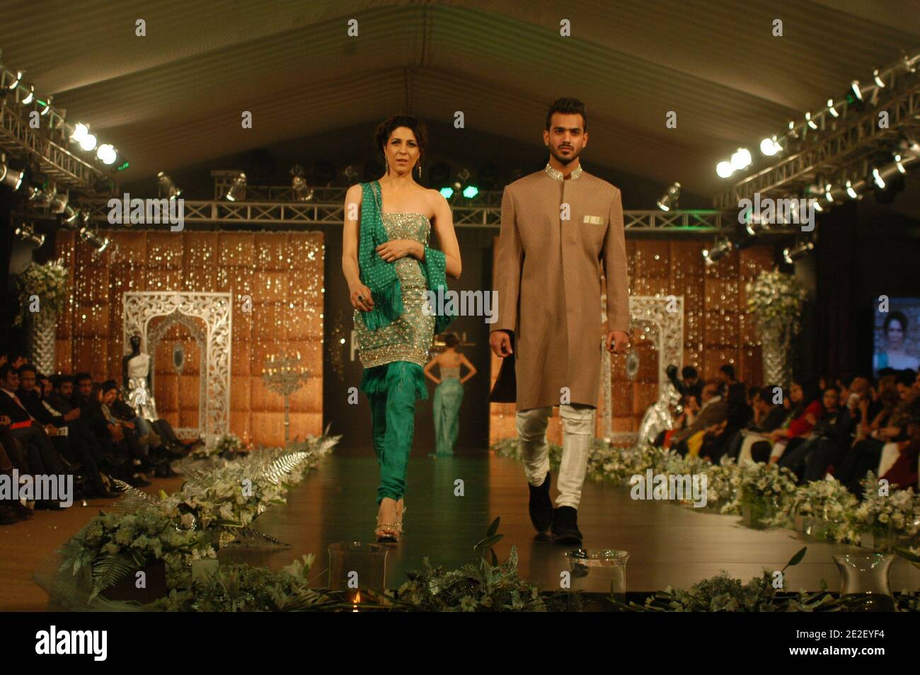 Pakistani models catwalk on ramp during the PFDC Loreal paris Bridal ...