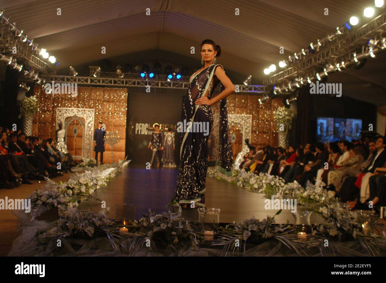 Pakistani models catwalk on ramp during the PFDC Loreal paris Bridal ...