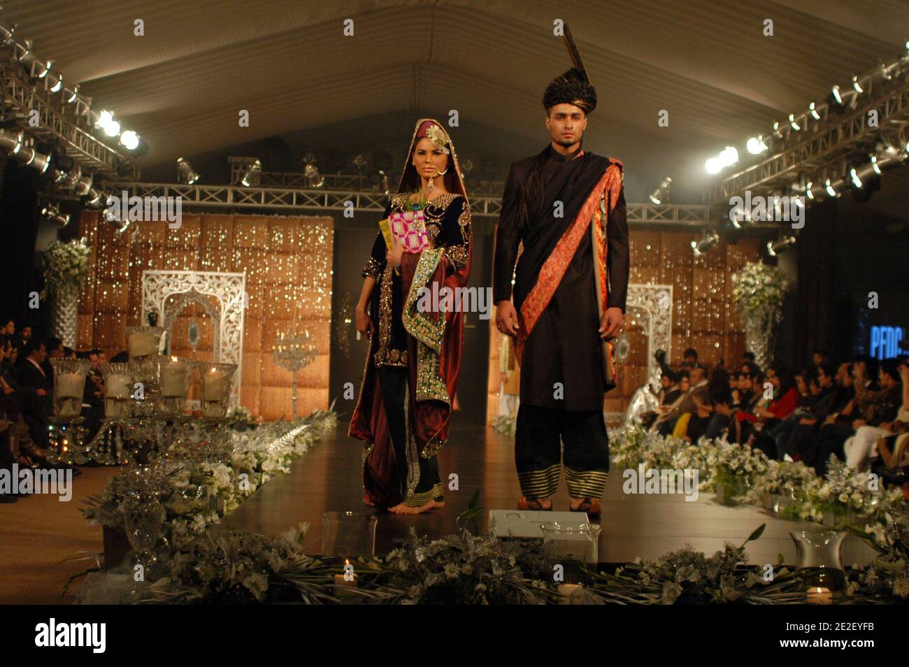 Pakistani models catwalk on ramp during the PFDC Loreal paris Bridal ...