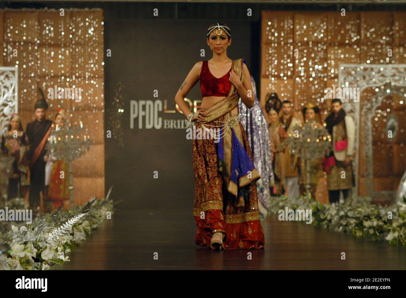 Pakistani models catwalk on ramp during the PFDC Loreal paris Bridal ...