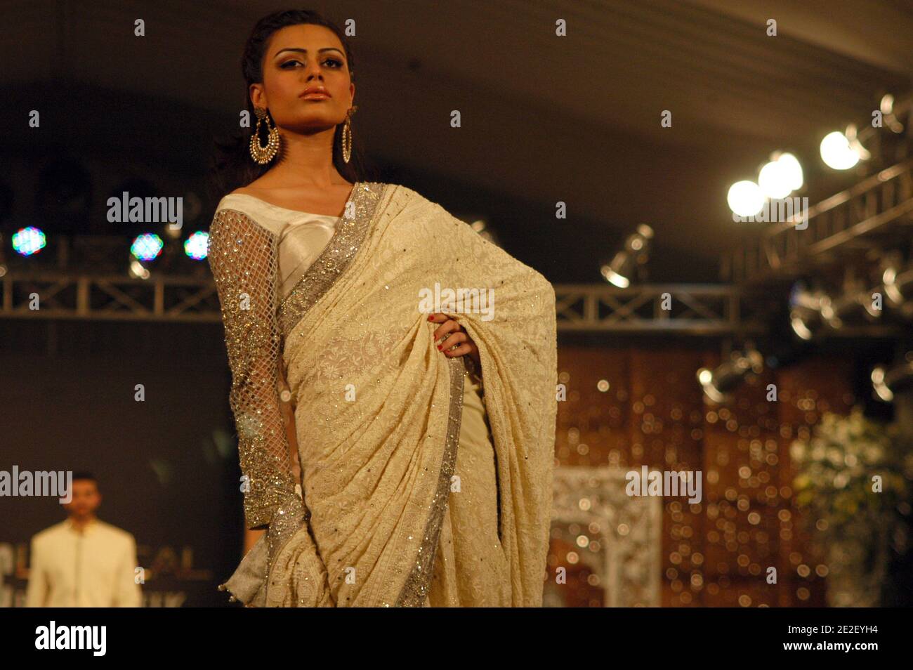 Pakistani models catwalk on ramp during the PFDC Loreal paris Bridal ...