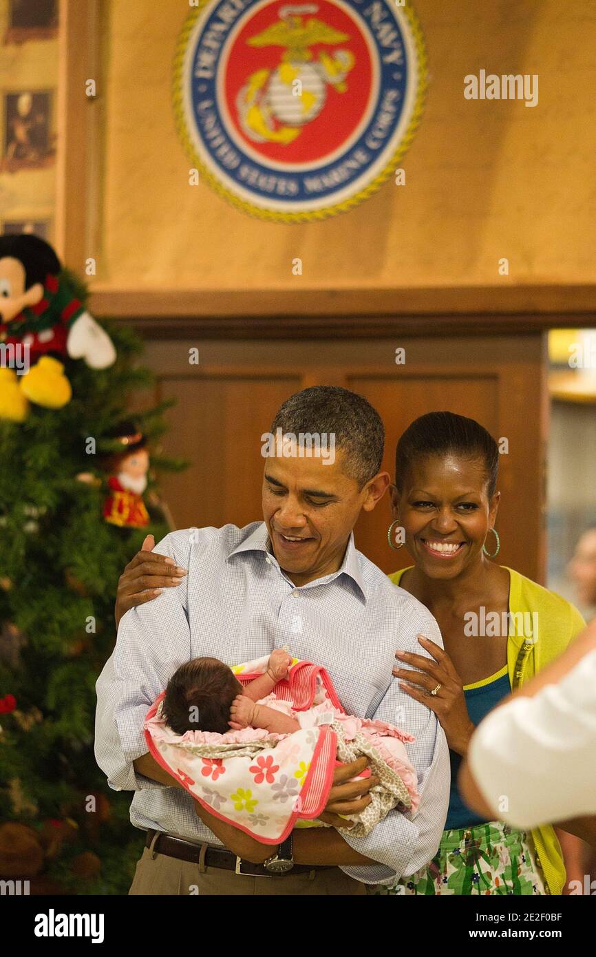 US President Barack Obama holds one month old Adeline Valentina ...