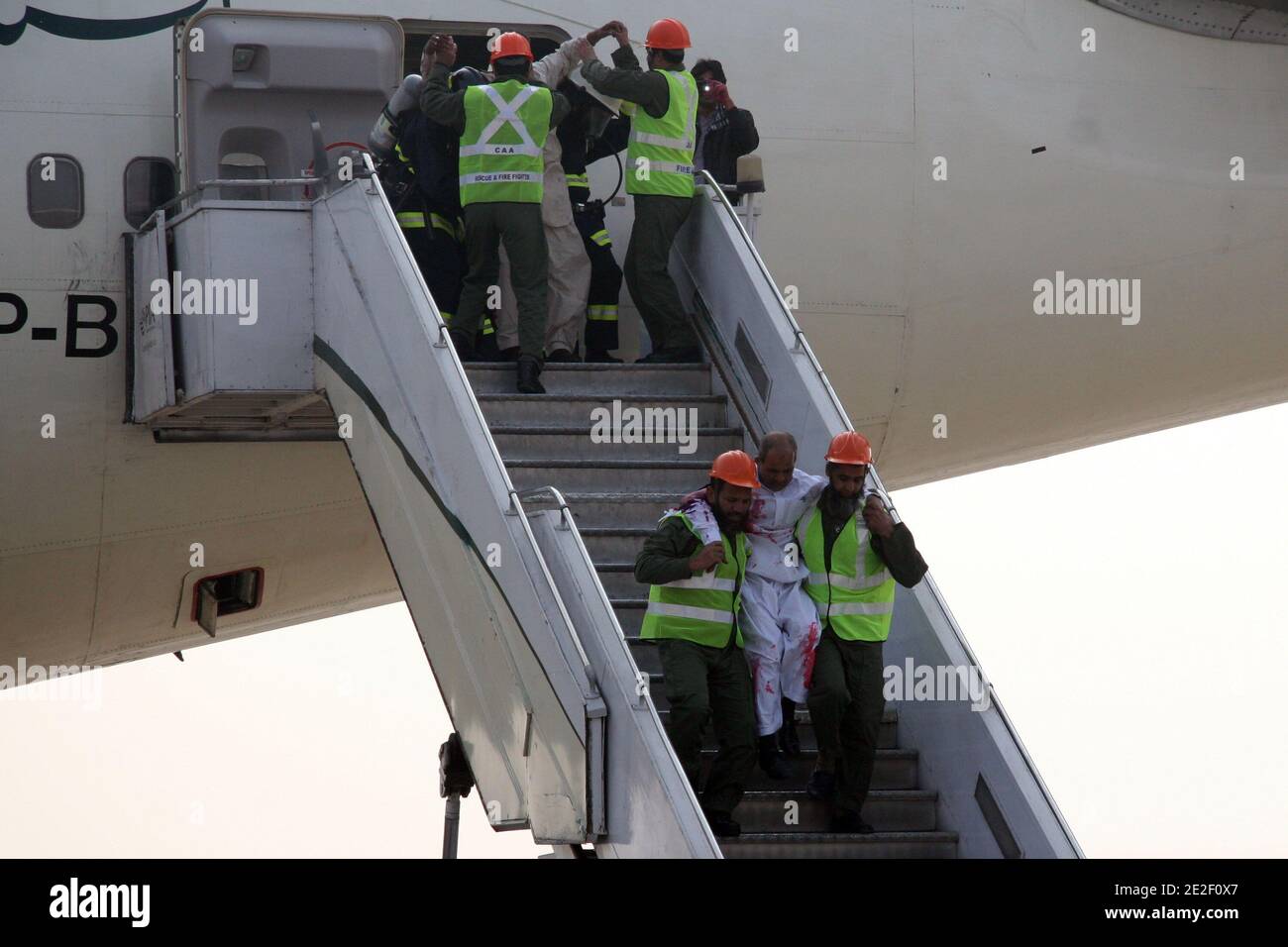 Rescue workers demonstrating their skills during a full scale exercise ...