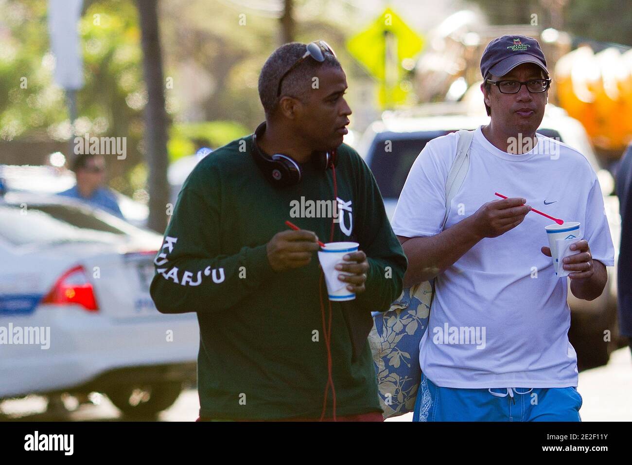 Martin Nesbitt and Mike Ramos, friends of US President Barack Obama eat ...