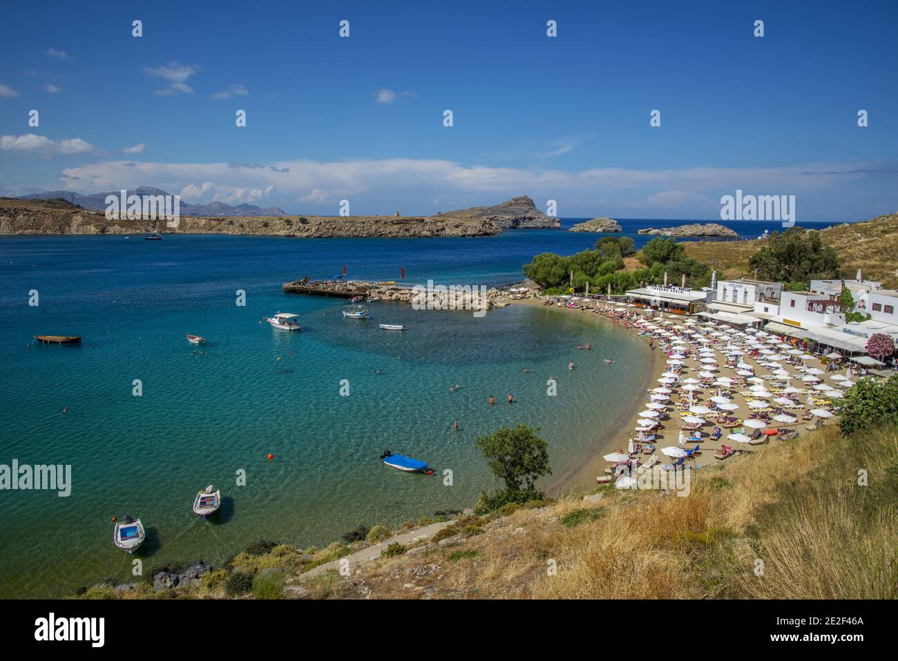 High angle shot of the beach and the sailing boats by the beautiful ...