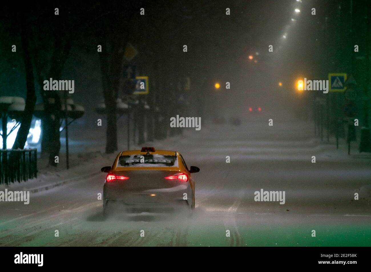 Heavy snowfall in Moscow, Russia. Car in traffic heacy snowfall Stock ...