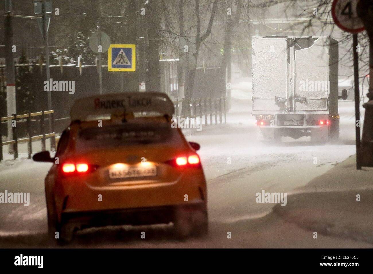 Heavy snowfall in Moscow, Russia. Car in traffic heacy snowfall Stock ...