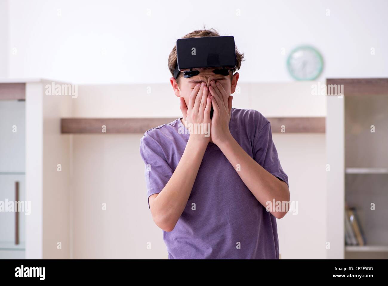 Schoolboy wearing virtual glasses hi-res stock photography and images ...