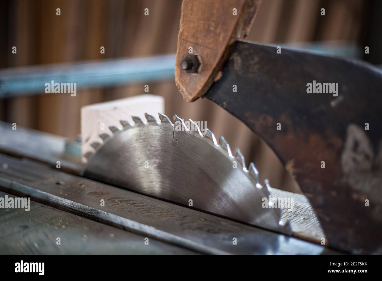 Round-shaped saw with sharp blades ready to cut as a part of an ...