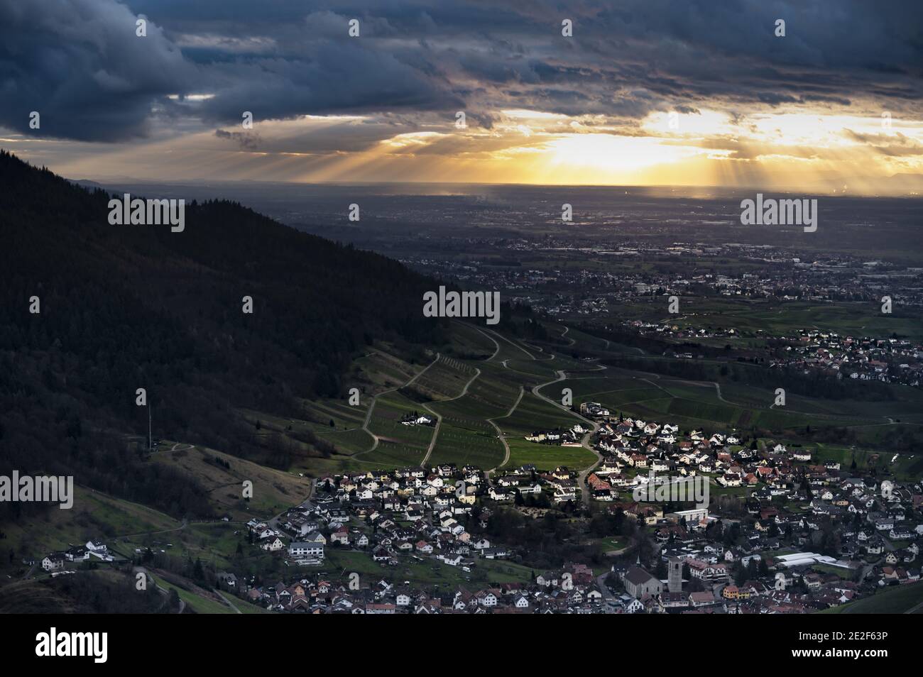 Aerial shot of the city with houses and other buildings under the ...