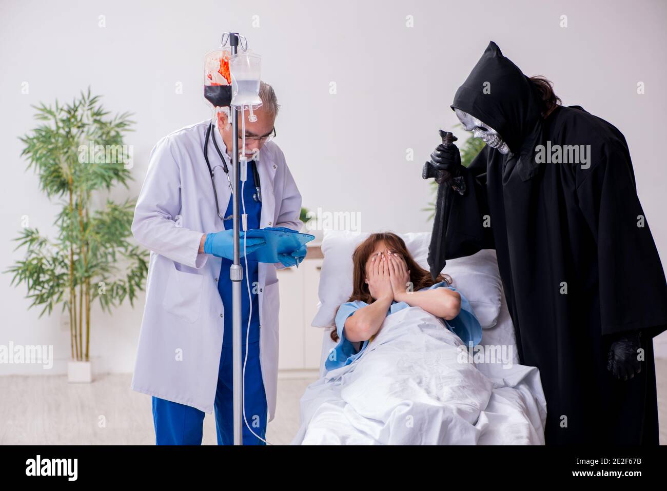 Devil, old doctor and female patient in clinic Stock Photo - Alamy