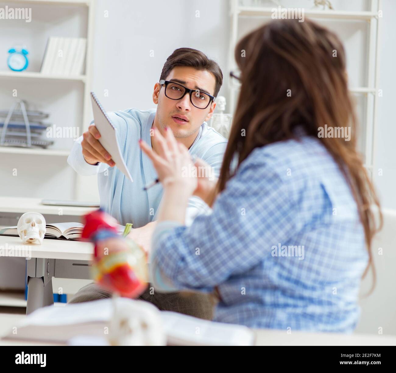The two medical students studying in classroom Stock Photo - Alamy