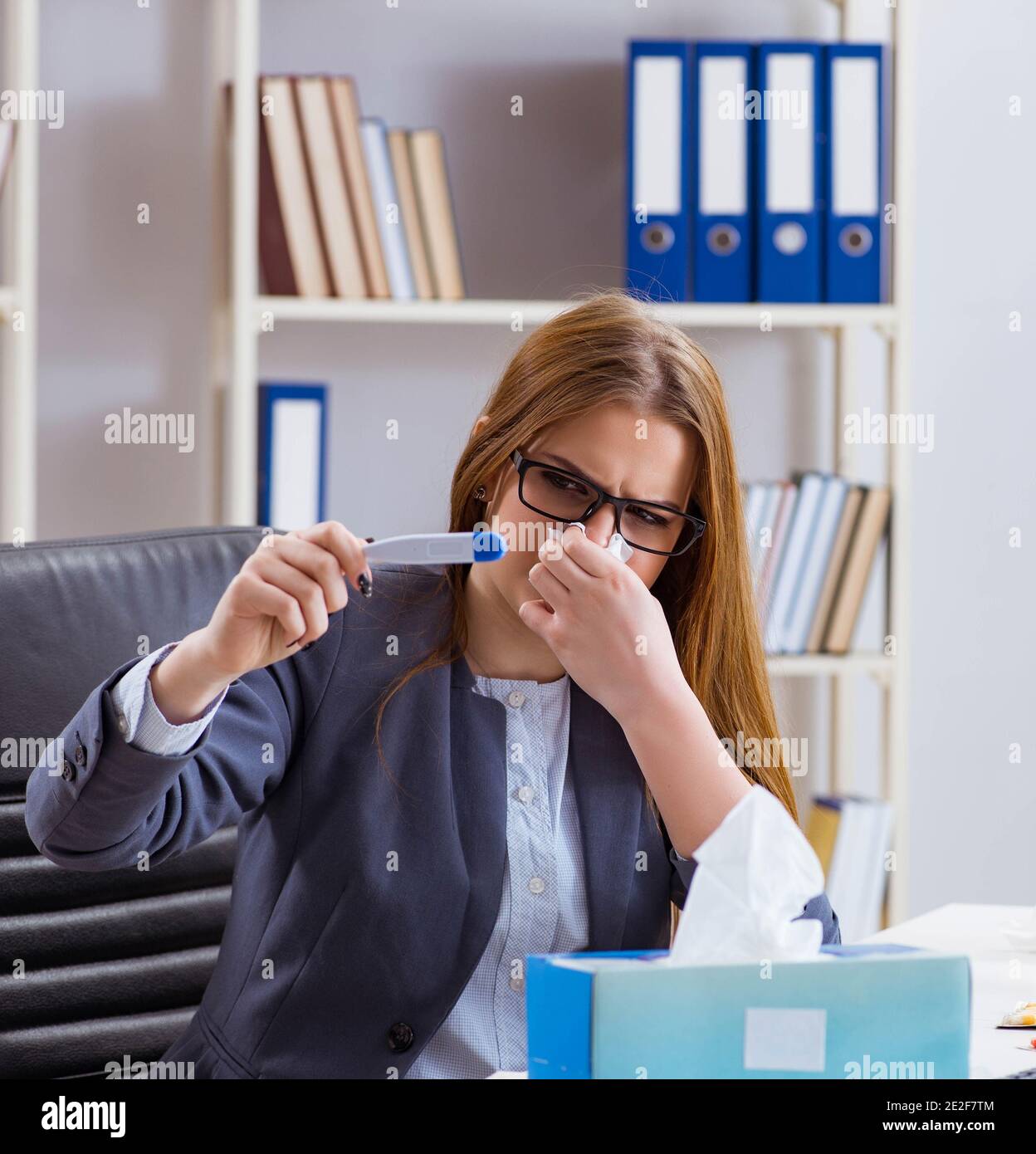The businesswoman employee sick in the office Stock Photo - Alamy