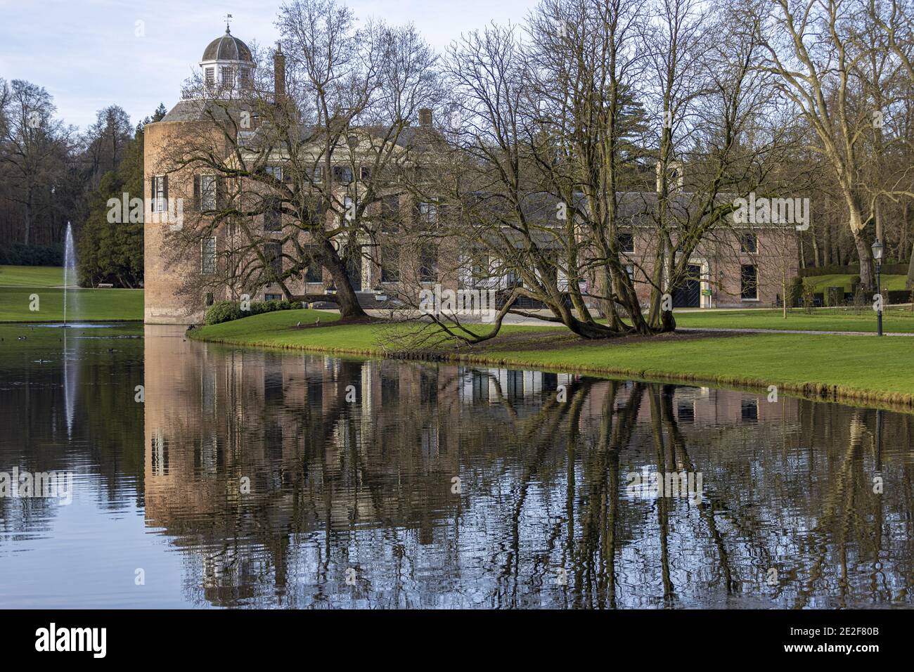 Moated castle in winter with mirroring reflection Stock Photo - Alamy