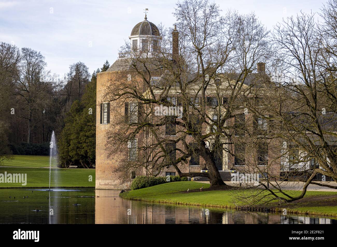 Moated castle in winter with mirroring reflection Stock Photo - Alamy