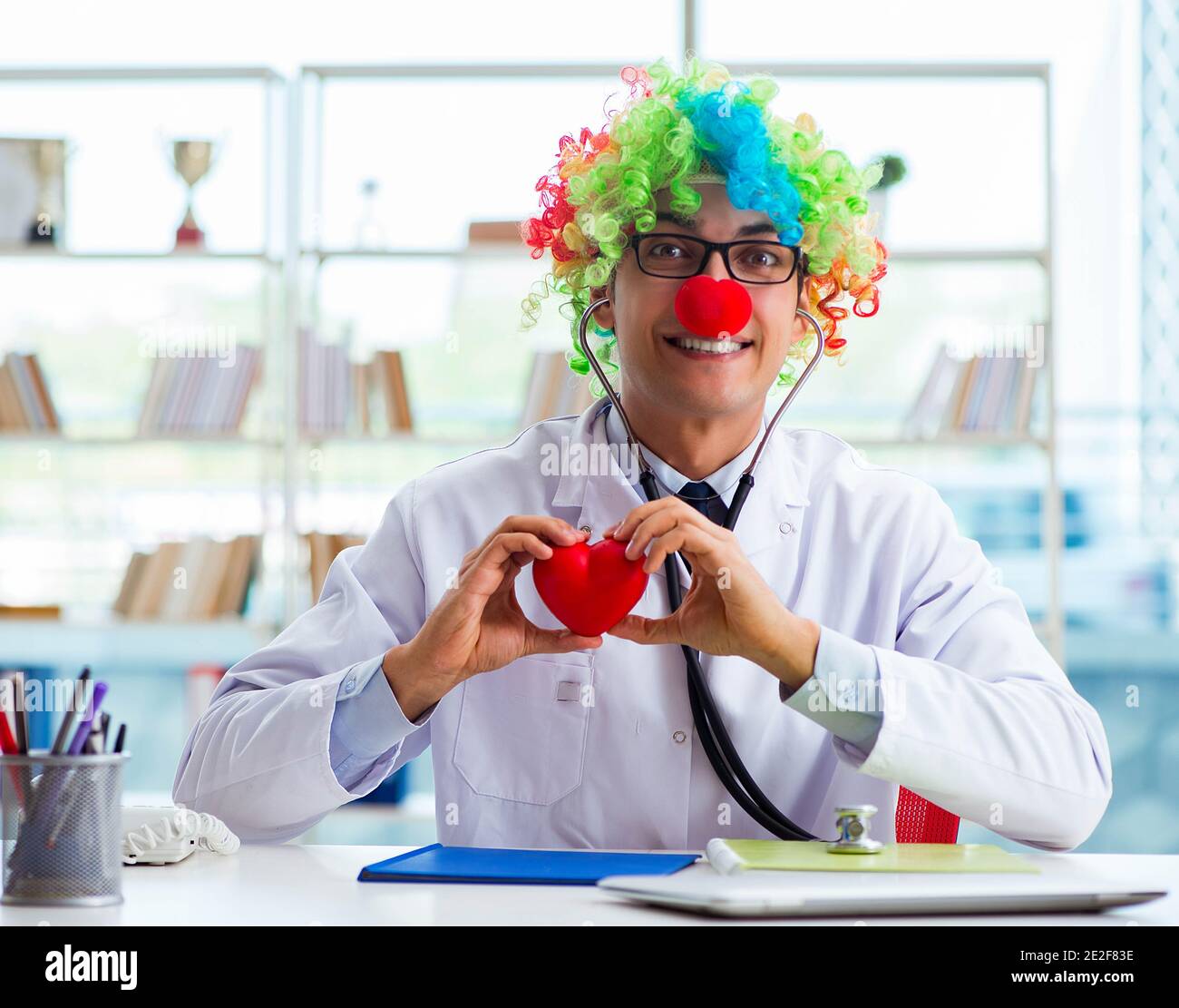 The child cardiologist with stethoscope and red heart Stock Photo - Alamy