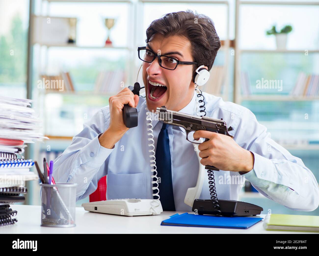 The unhappy angry call center worker frustrated with workload Stock ...