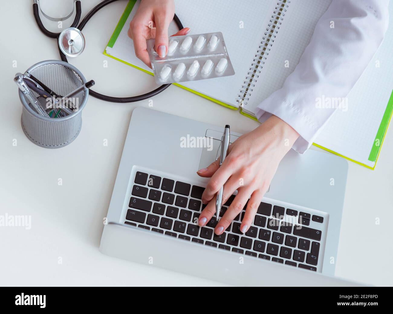 The hand writing medical prescription in computer Stock Photo - Alamy