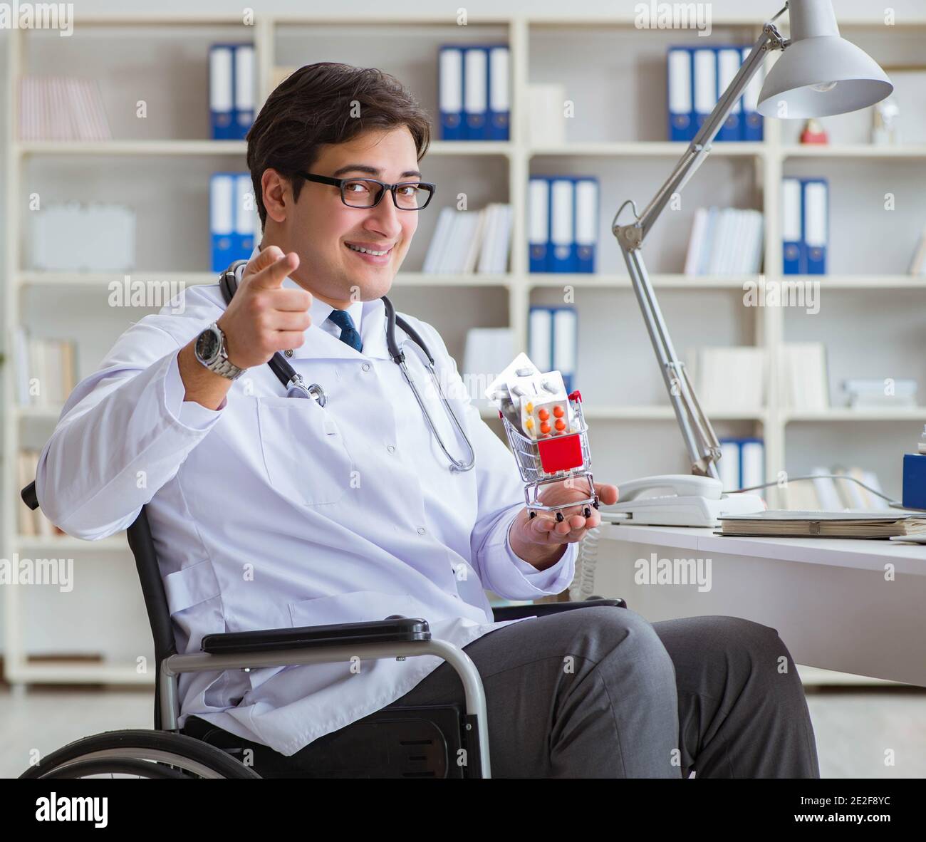 The disabled doctor on wheelchair working in hospital Stock Photo - Alamy