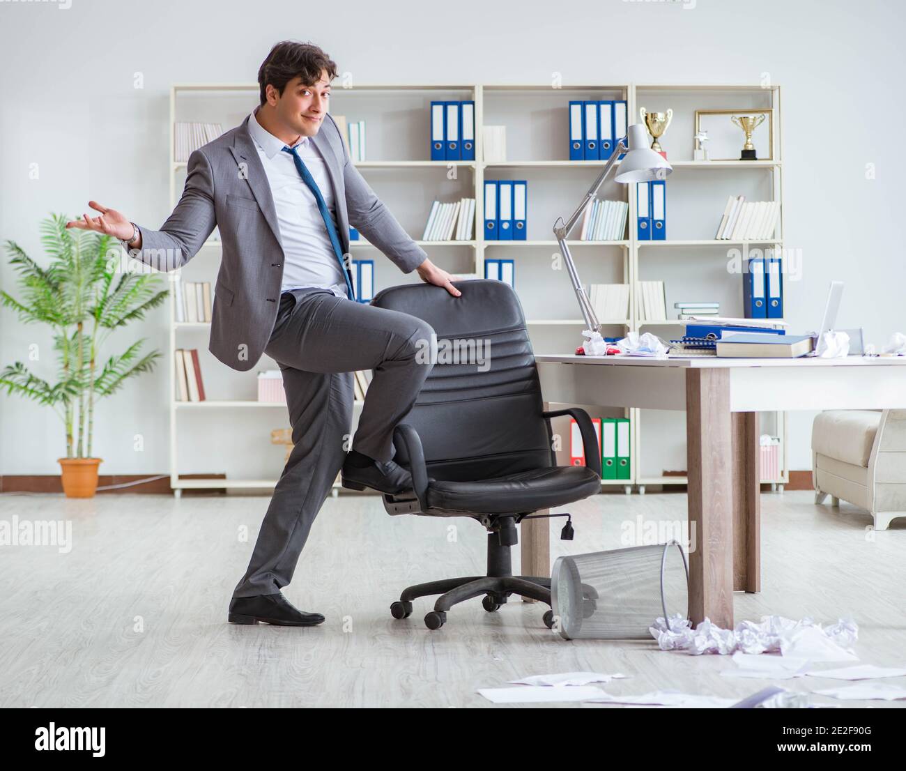 The businessman having fun taking a break in the office at work Stock ...