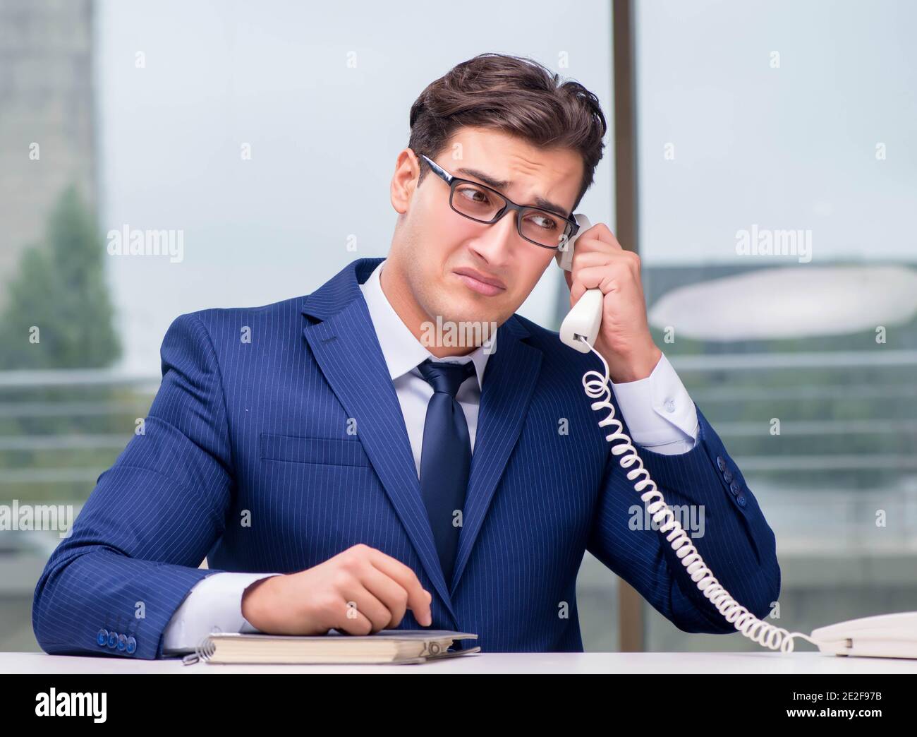 The angry call center employee yelling at customer Stock Photo - Alamy