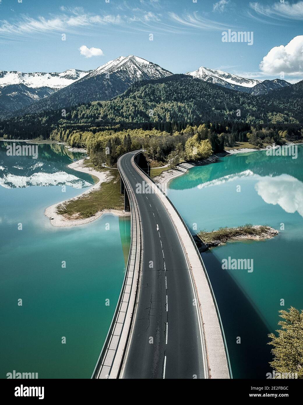 Bridge-road to the alps over the mountain lake of Silverstein in ...