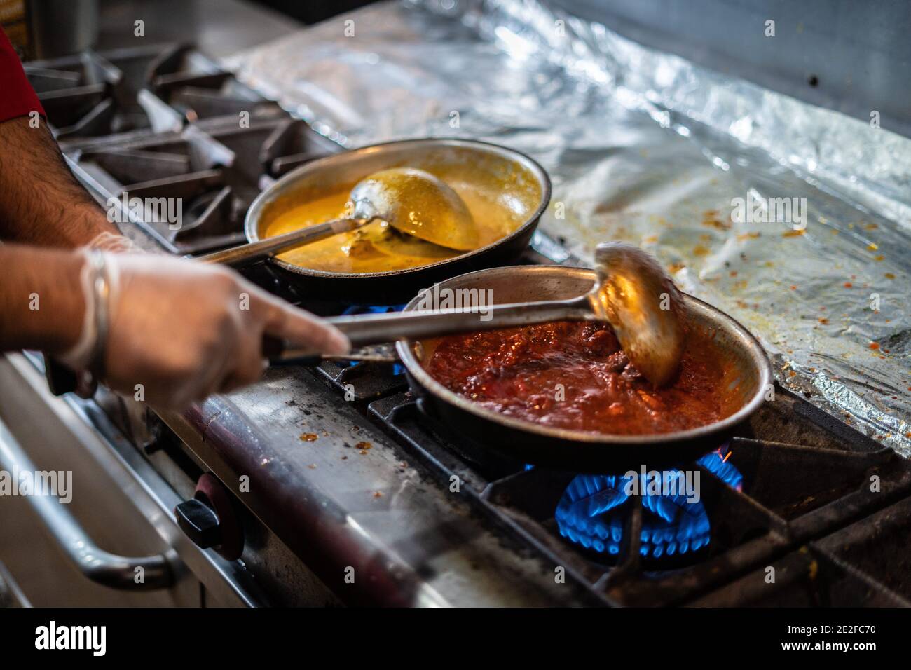 Cooking indian style cuisine food Stock Photo - Alamy