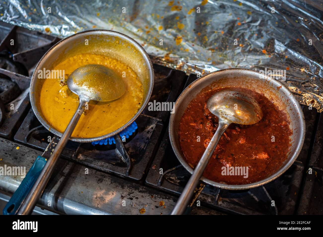 Cooking indian style cuisine food Stock Photo - Alamy