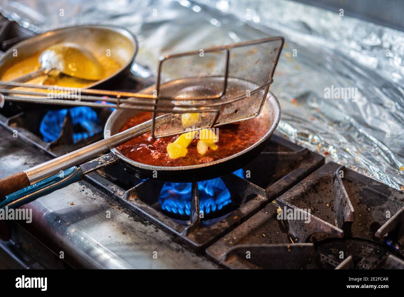 Cooking indian style cuisine food Stock Photo - Alamy