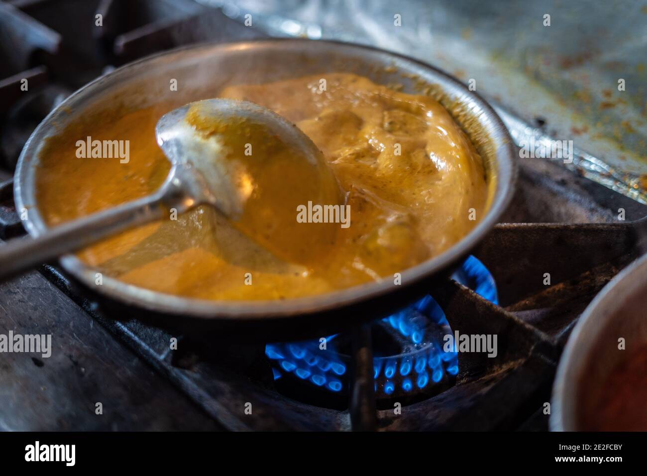 Cooking indian style cuisine food Stock Photo - Alamy