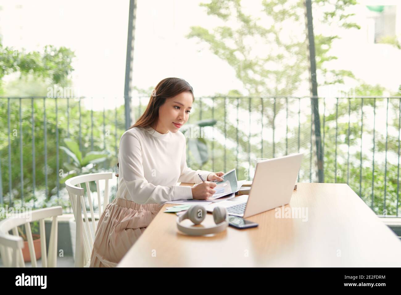 Beautiful korean woman using computer hi-res stock photography and ...