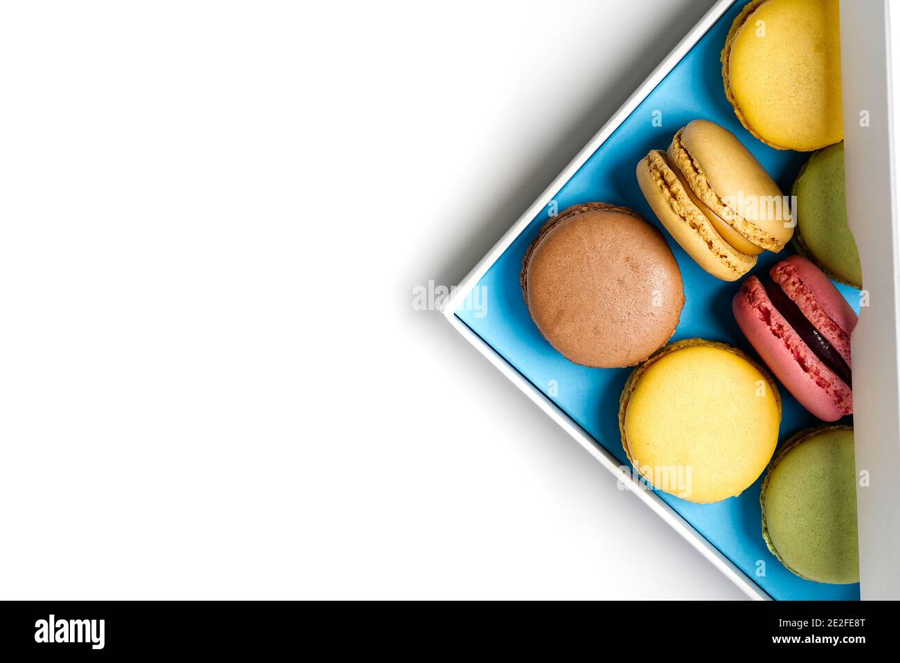 Colorful small macarons in the box with copy space Stock Photo - Alamy