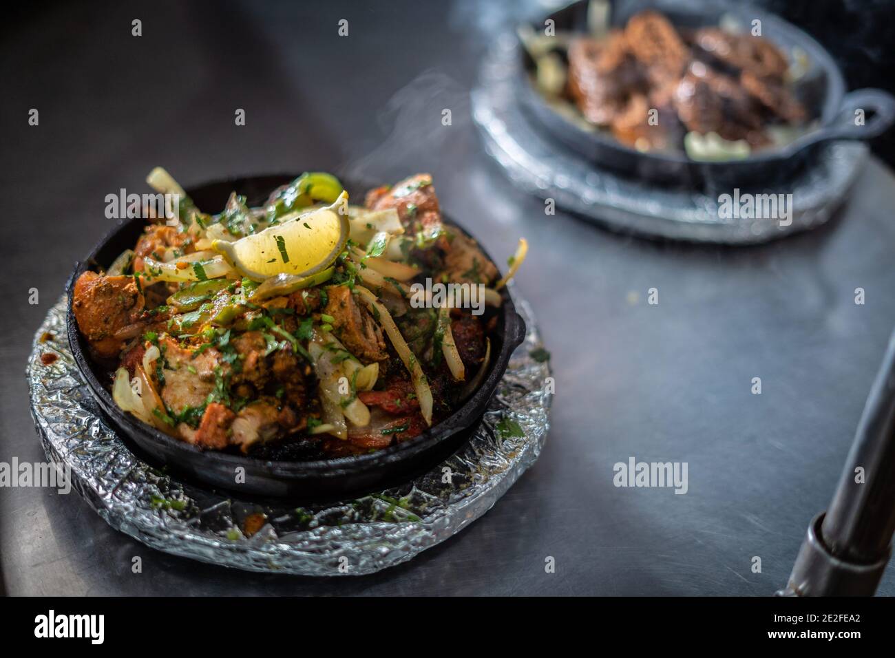 Indian kebab platter in hot sizzling plate Stock Photo - Alamy