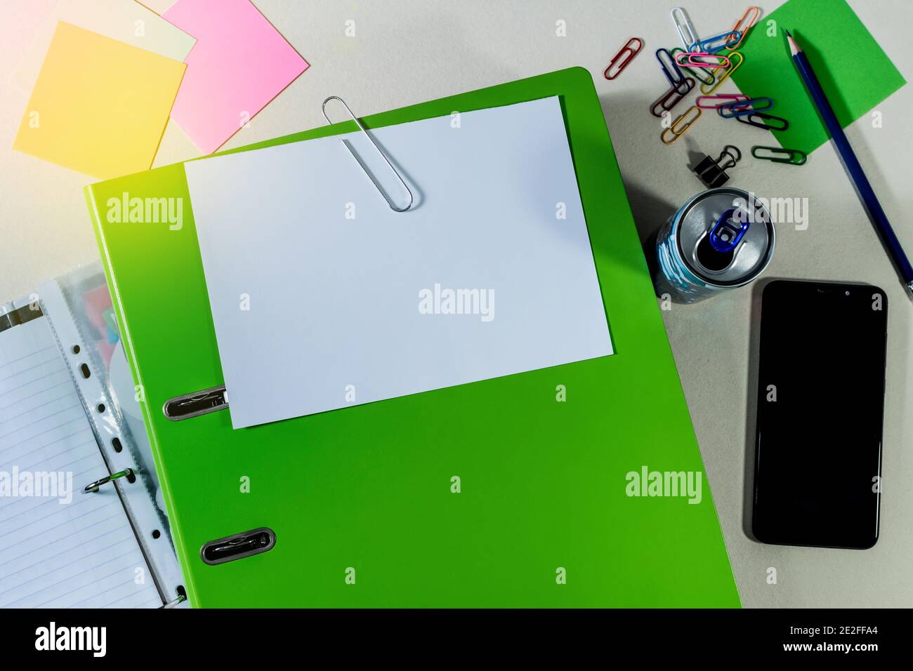 Top view of office folder with copy space and other office supplies on ...